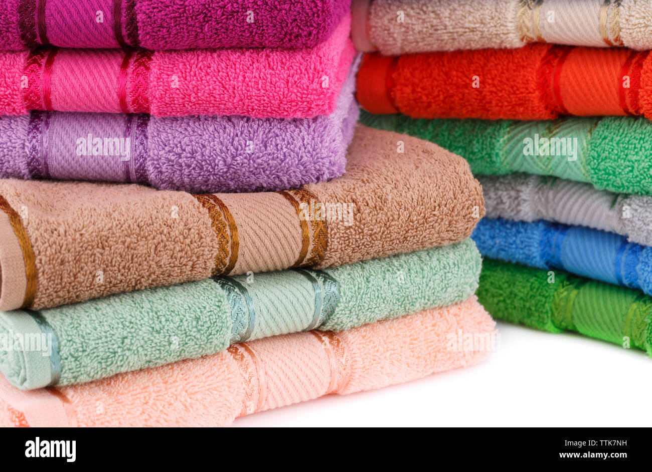 Colorful towels stacks closeup picture Stock Photo - Alamy