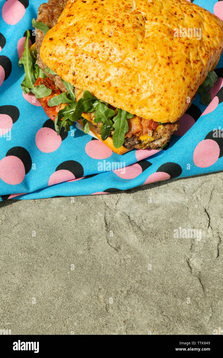 Street food burger on napkin Stock Photo - Alamy