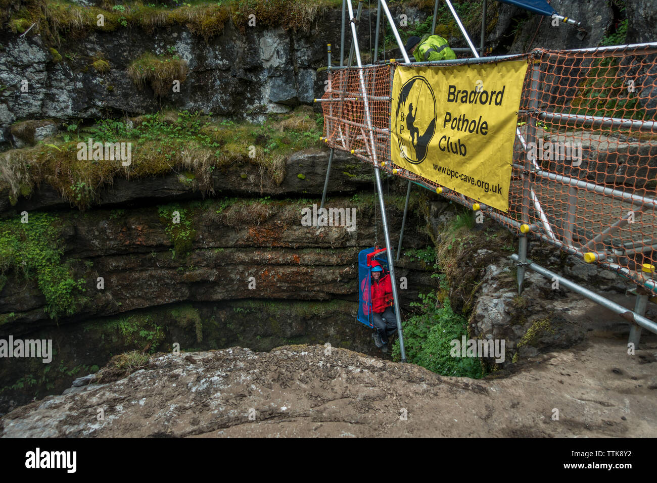 A tourist is winched into Gaping Gill by the Bradford Pothole Club, one ...