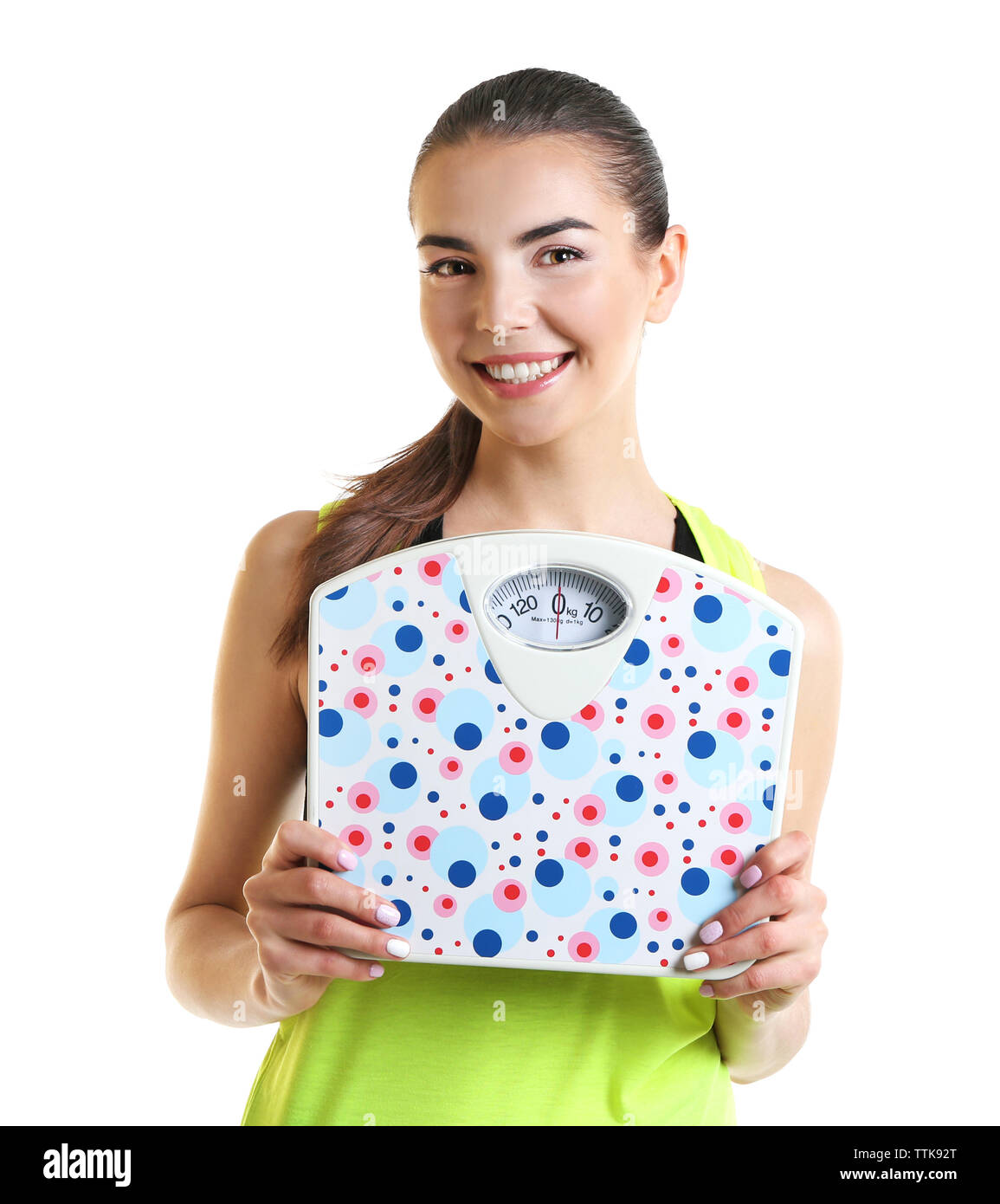 Young beautiful woman with scale isolated on white Stock Photo - Alamy