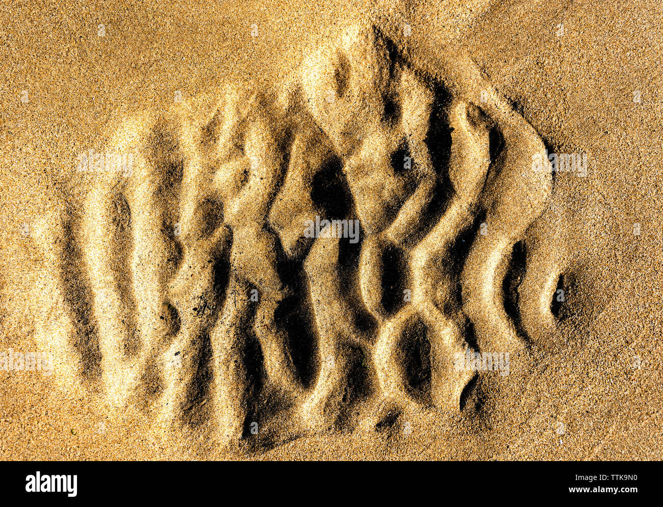 Sand textures and shadows Stock Photo - Alamy