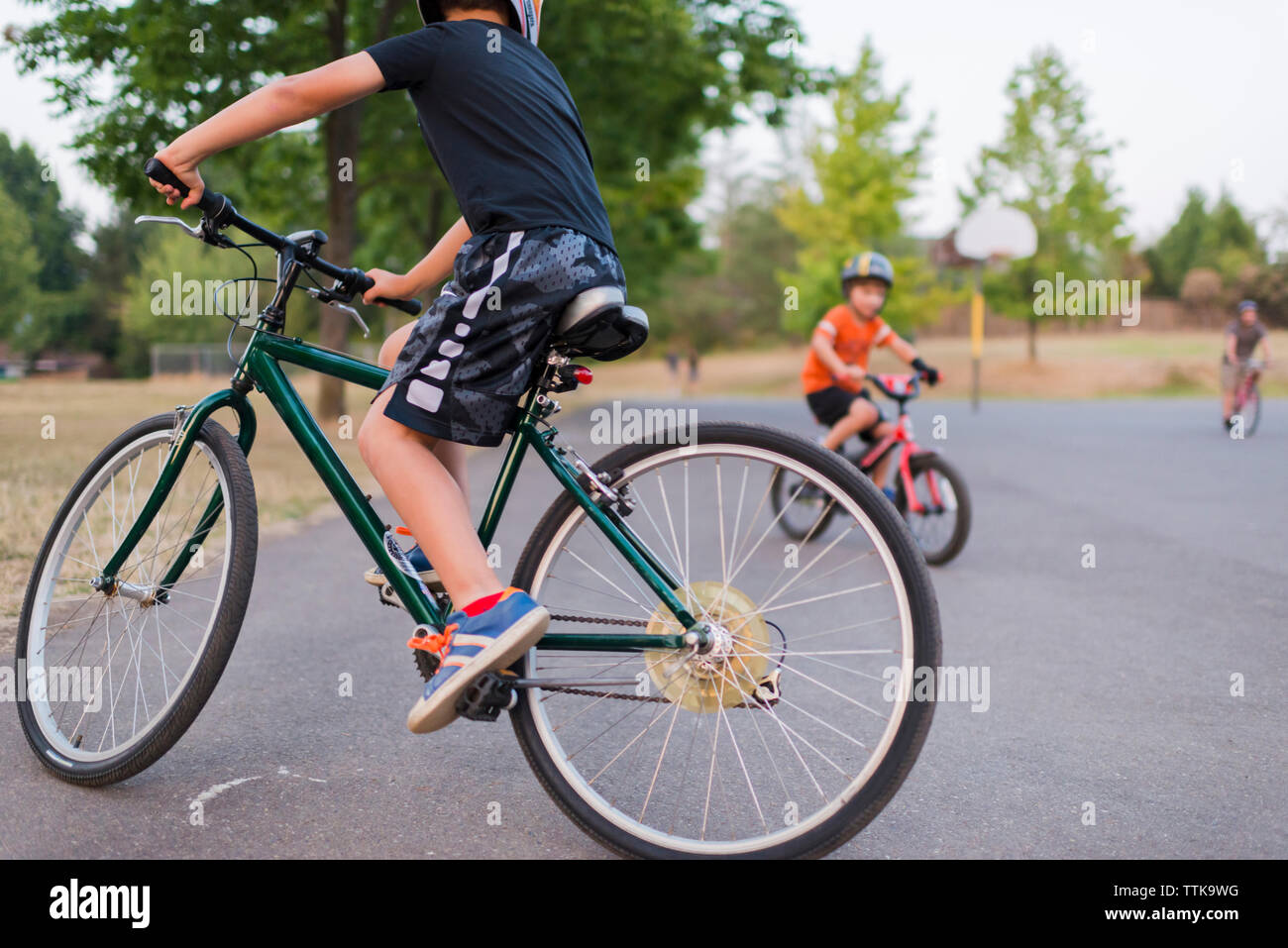 Two boys on bicycles hi-res stock photography and images - Alamy