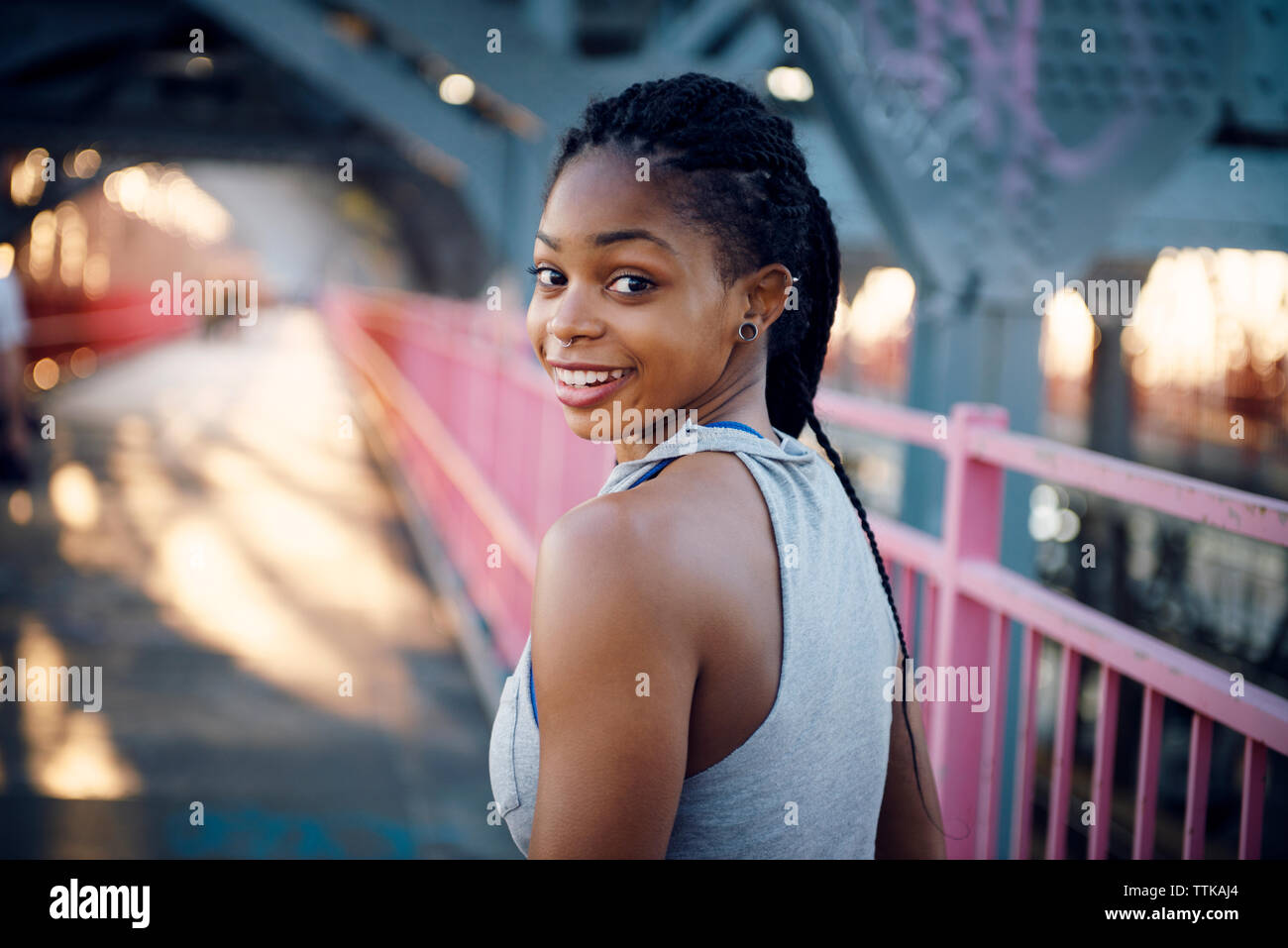 Woman standing bridge hi-res stock photography and images - Alamy