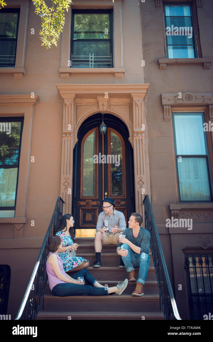 Sitting on steps outside hi-res stock photography and images - Alamy