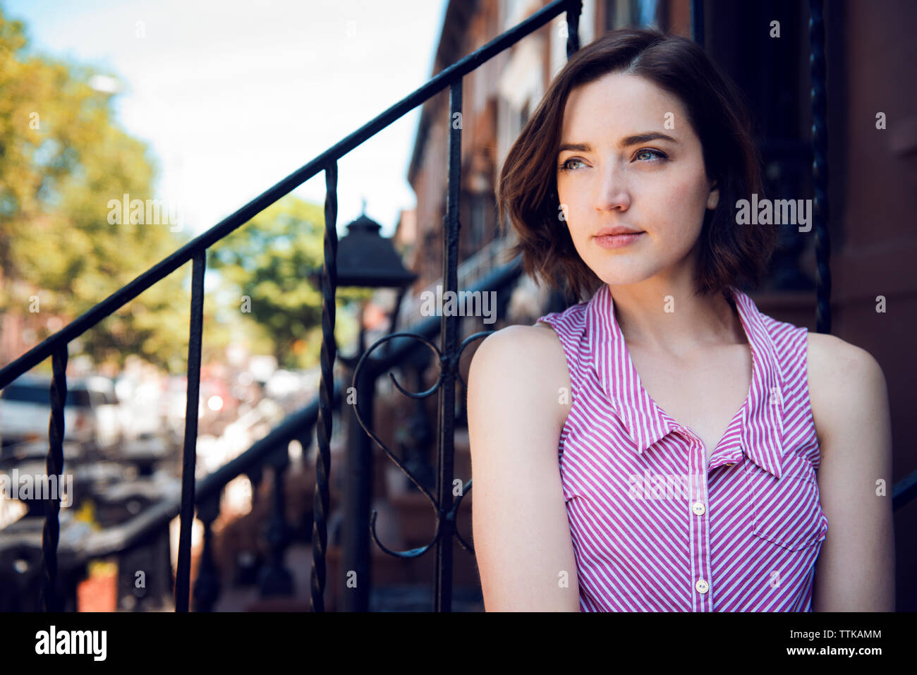 Sitting on steps outside hi-res stock photography and images - Alamy