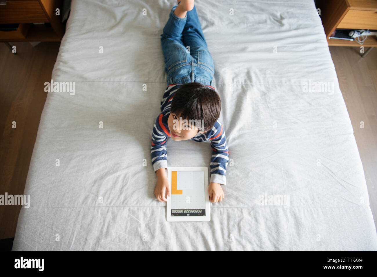 Smiling tablet hi-res stock photography and images - Alamy