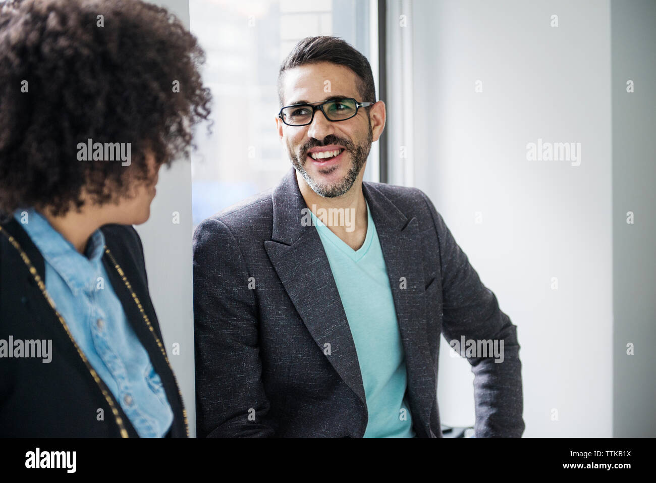 Businessman talking colleague hi-res stock photography and images - Alamy