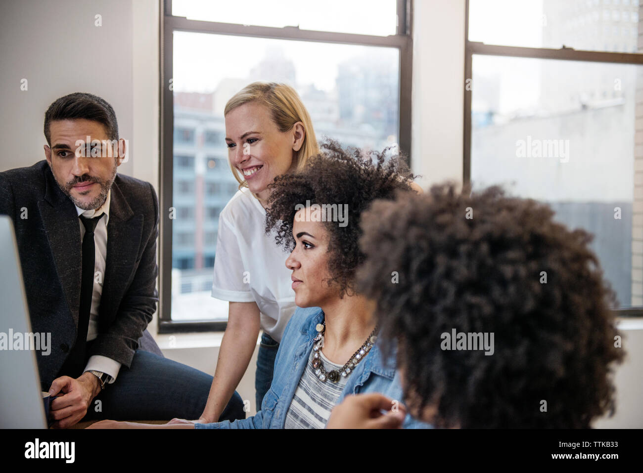 Happy colleagues hi-res stock photography and images - Alamy