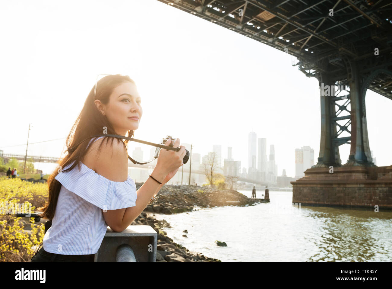 View from below female standing hi-res stock photography and images - Alamy