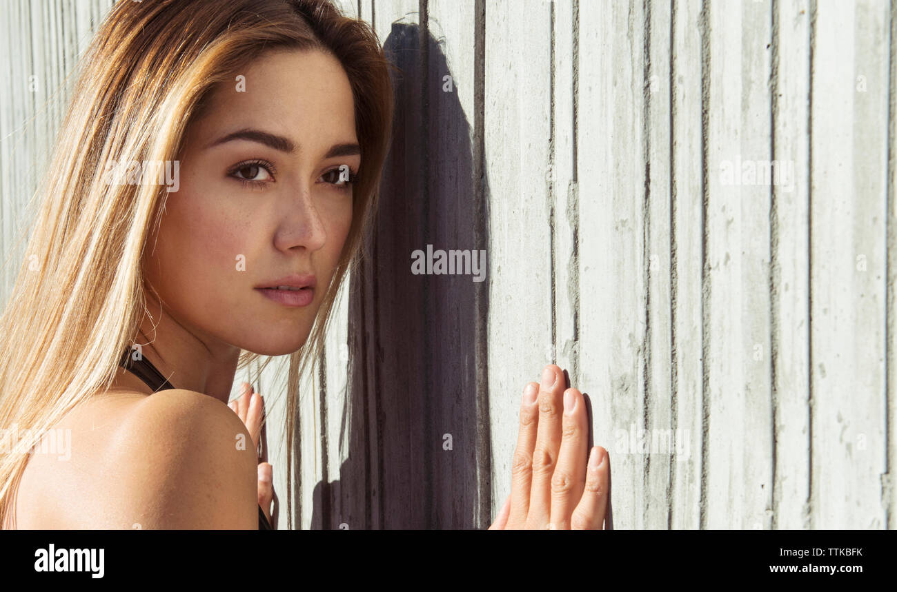 Woman wall hi-res stock photography and images - Alamy