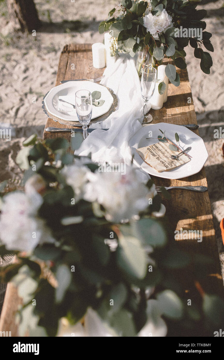 High angle view of place setting at beach during wedding ceremony Stock ...