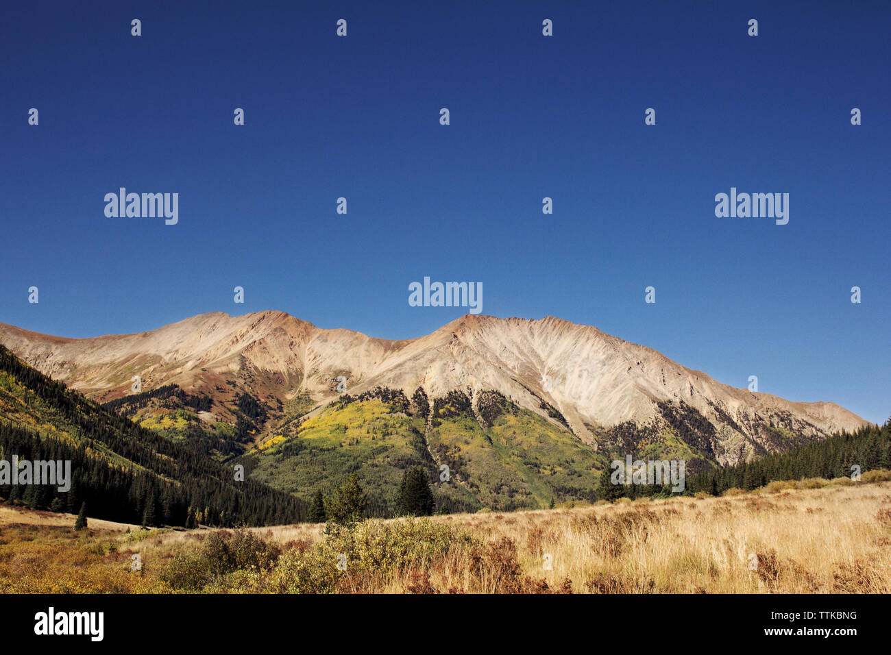 Scenic view of mountains against clear blue sky Stock Photo - Alamy