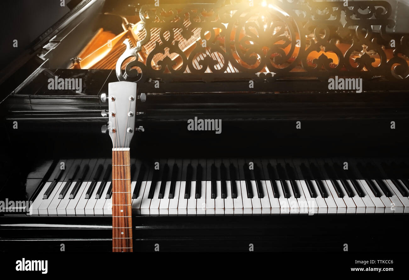 Guitar with piano, close up Stock Photo - Alamy