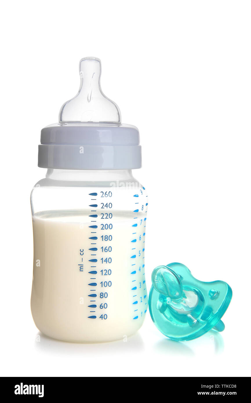 Baby milk bottle with pacifier, isolated on white Stock Photo - Alamy