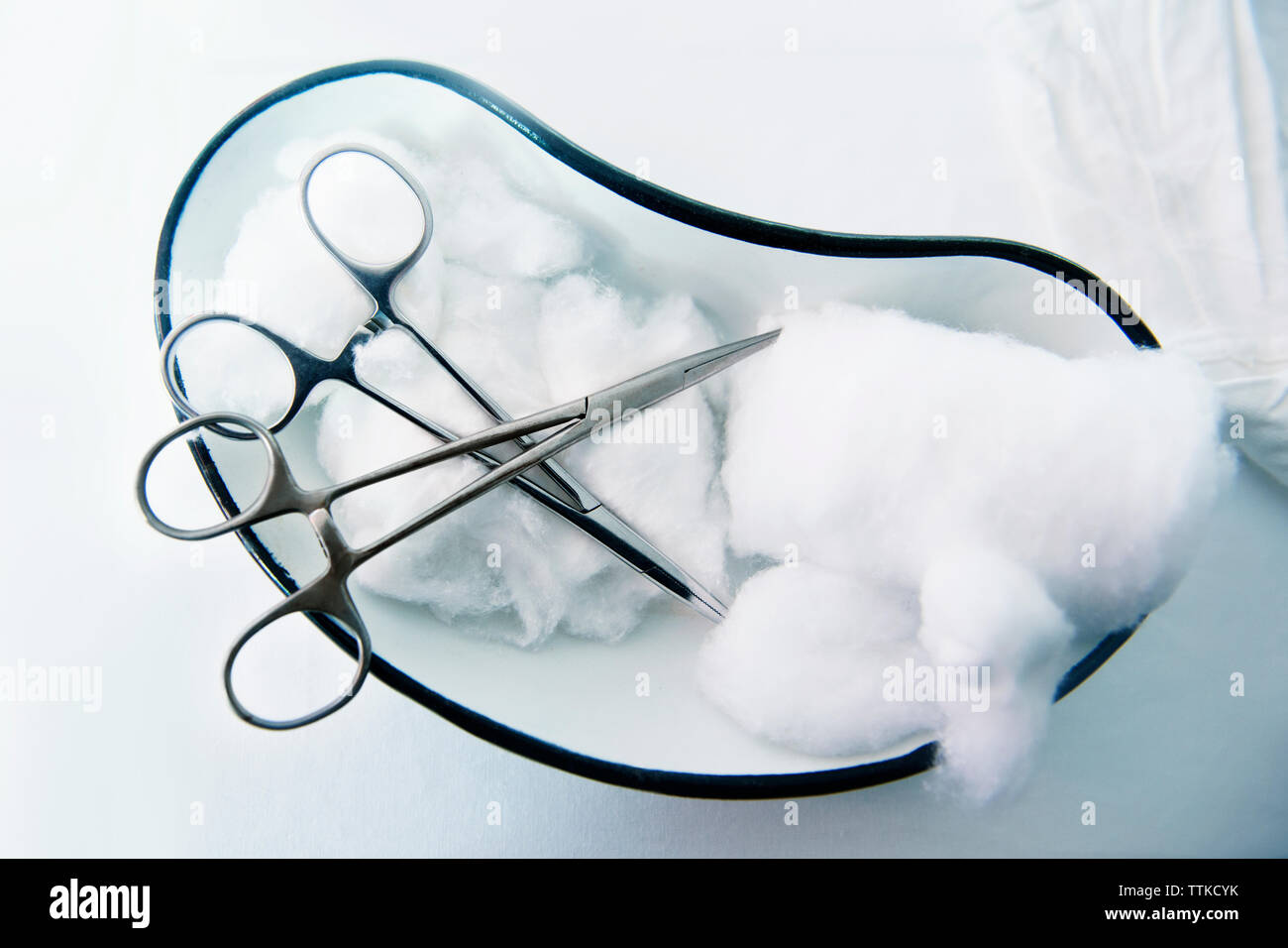 Overhead view of scissors and cotton on table in hospital Stock Photo ...