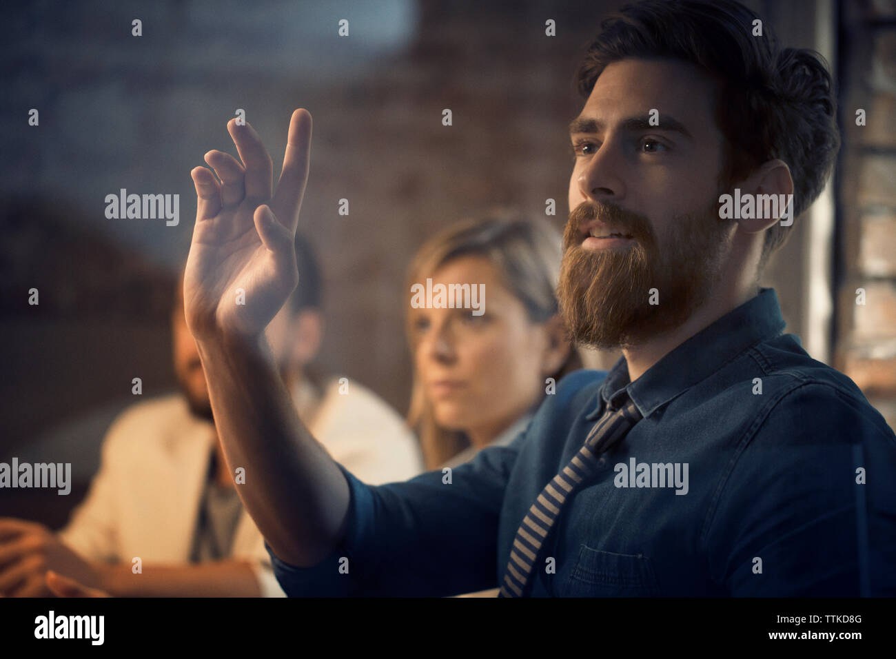 Businesswoman raising hand hi-res stock photography and images - Alamy