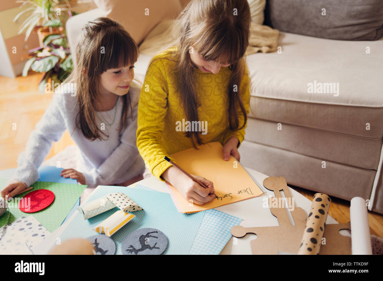 Sister writing hi-res stock photography and images - Alamy