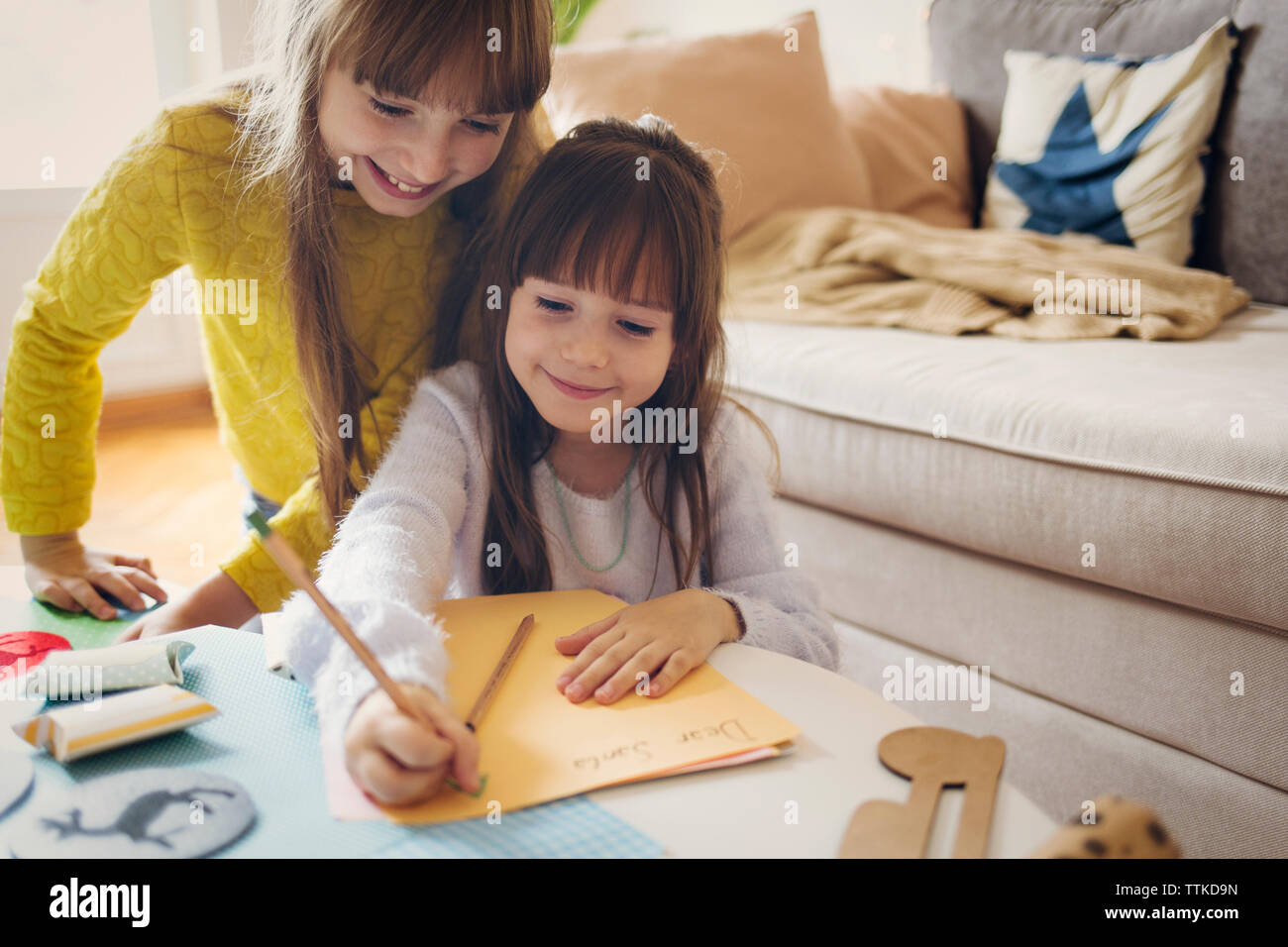 Family writing hi-res stock photography and images - Alamy