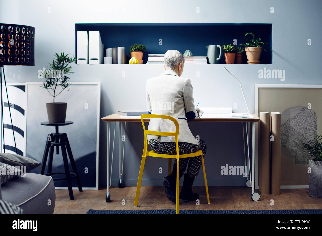 Mature woman office rear view hi-res stock photography and images - Alamy