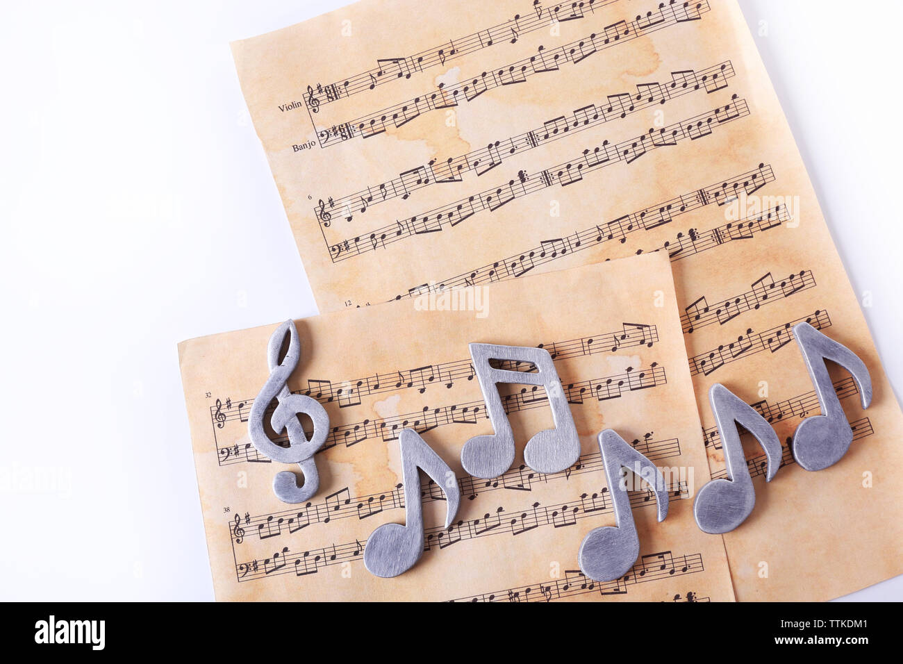 Music notes on table Stock Photo - Alamy