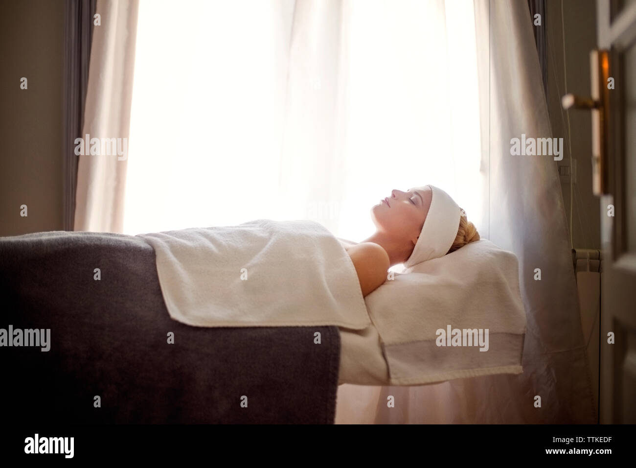 Woman lying old curtain curtain hi-res stock photography and images - Alamy