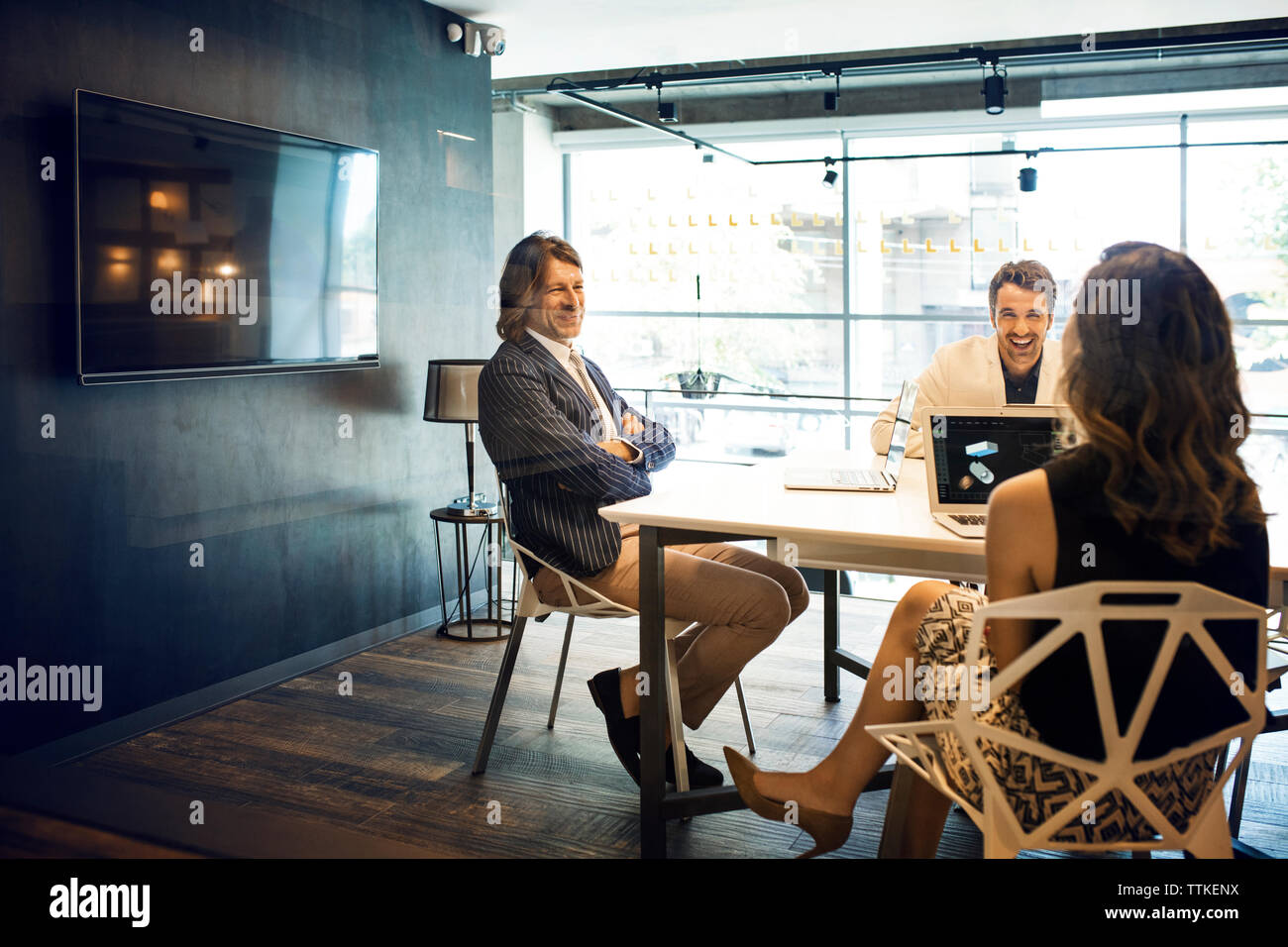 Business people smiling together hi-res stock photography and images ...
