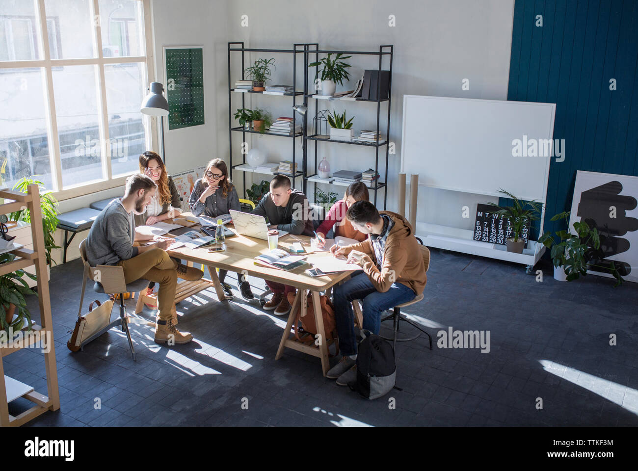 High angle view of serious students studying in classroom Stock Photo ...