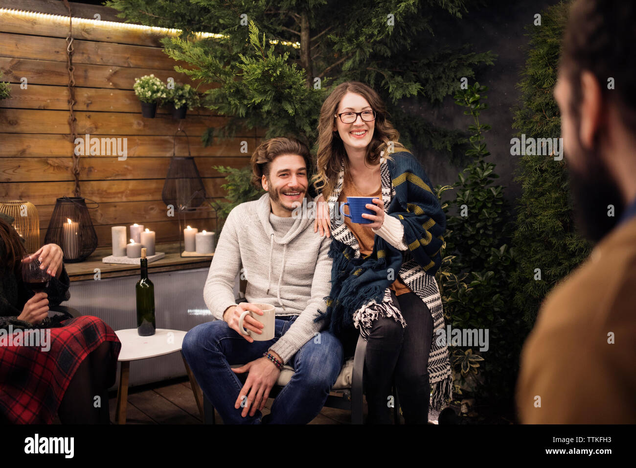 Old people sitting outdoors night hi-res stock photography and images ...