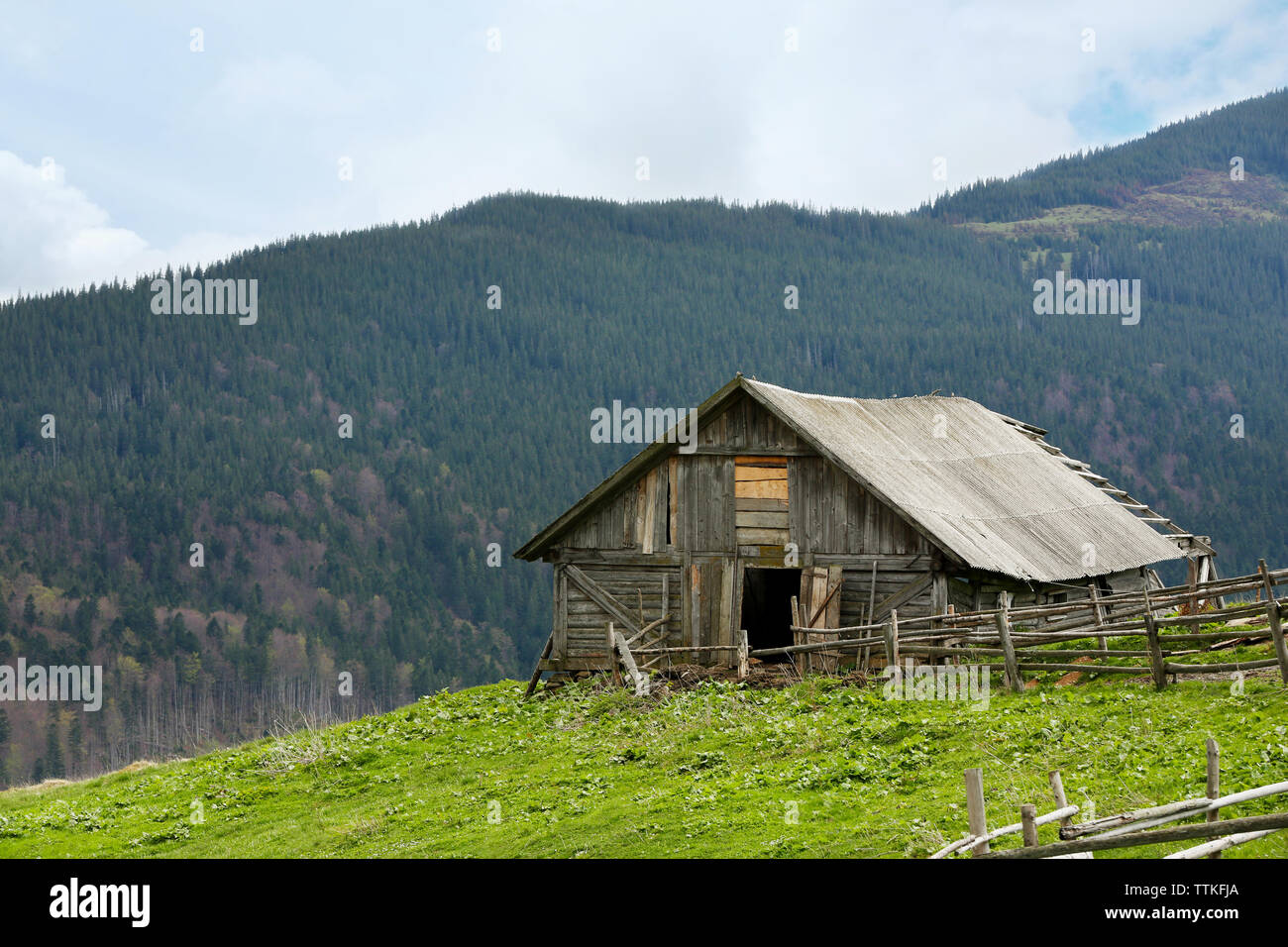 Old single house in mountains Stock Photo - Alamy