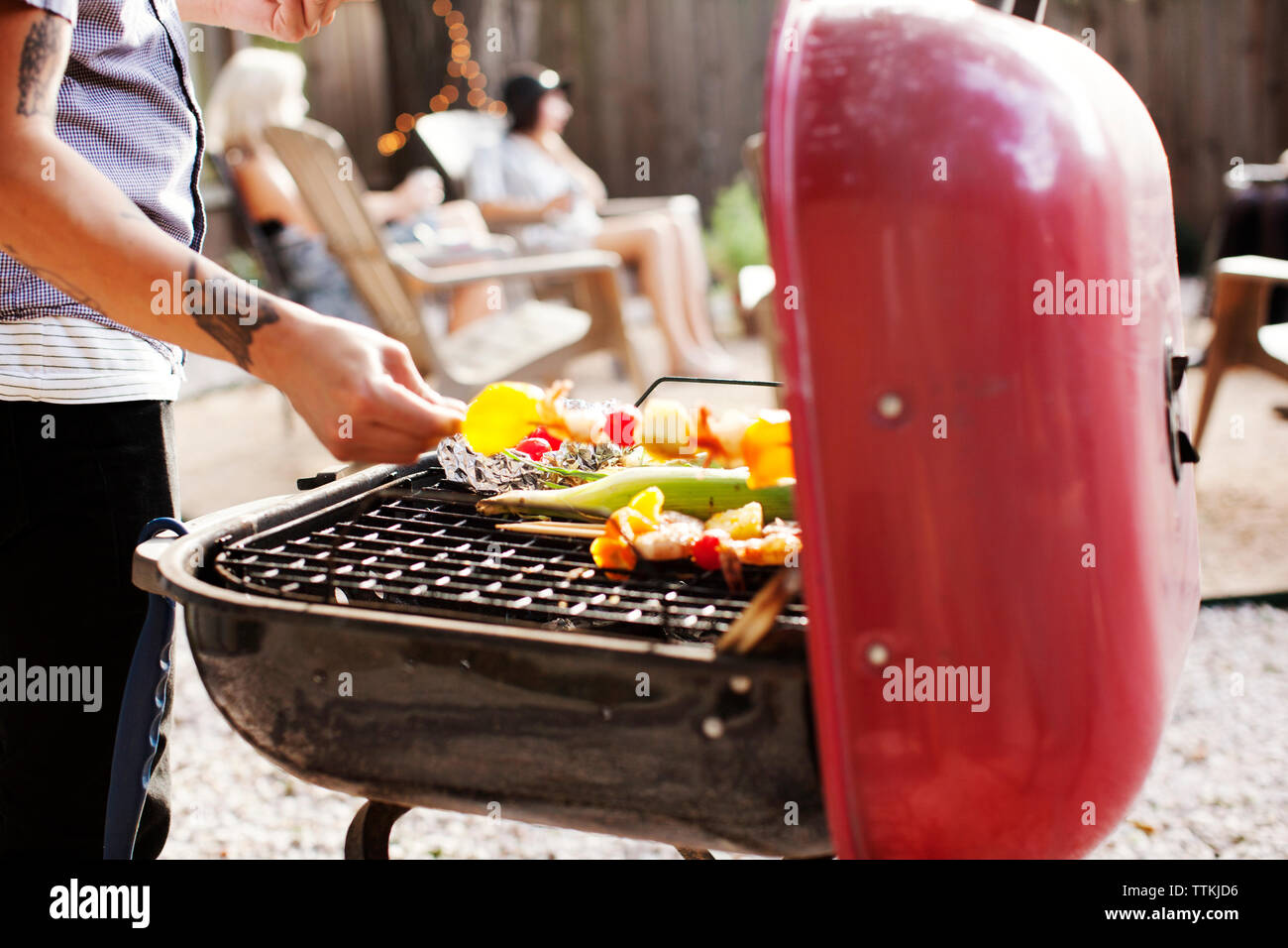 Barbecuing grill hi-res stock photography and images - Alamy