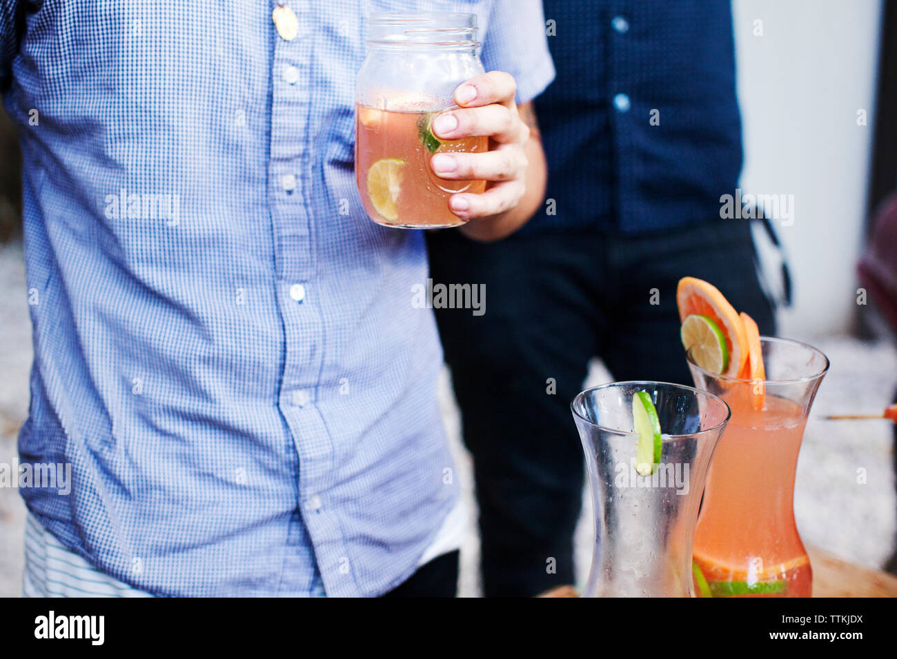 Holding jars hi-res stock photography and images - Alamy