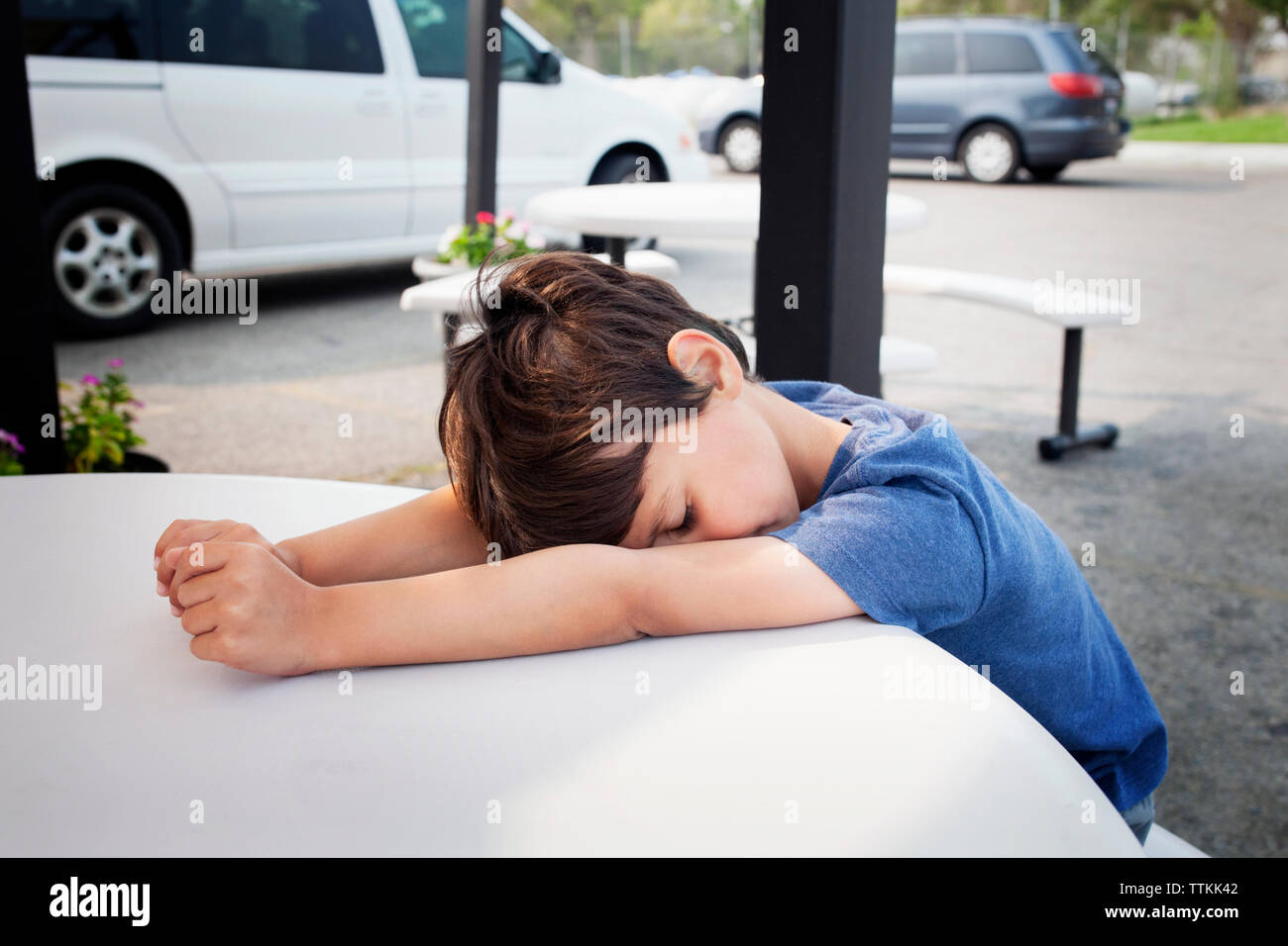 Boy table hi-res stock photography and images - Alamy