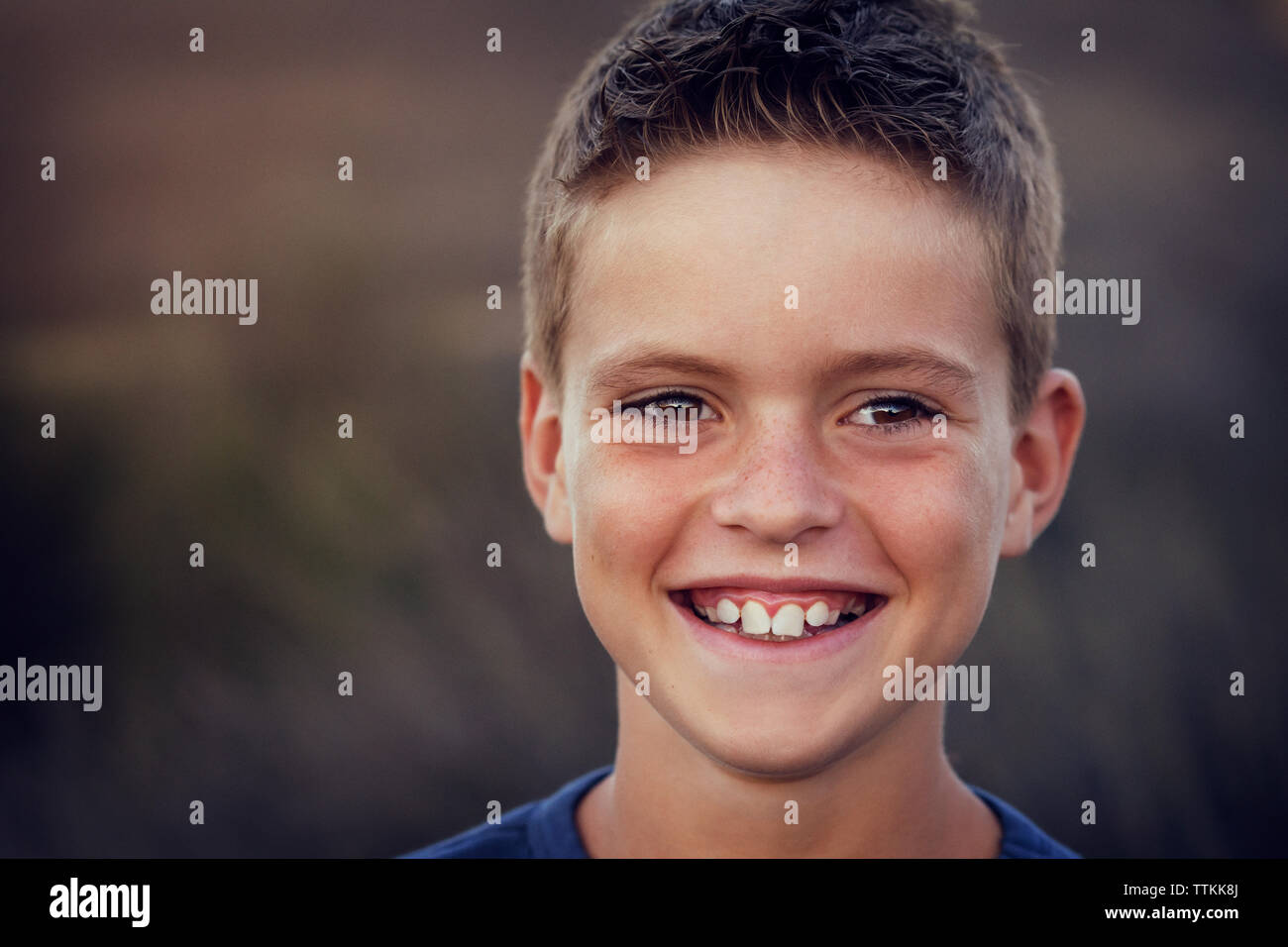 Boy 8 years old portrait smiling park hi-res stock photography and ...