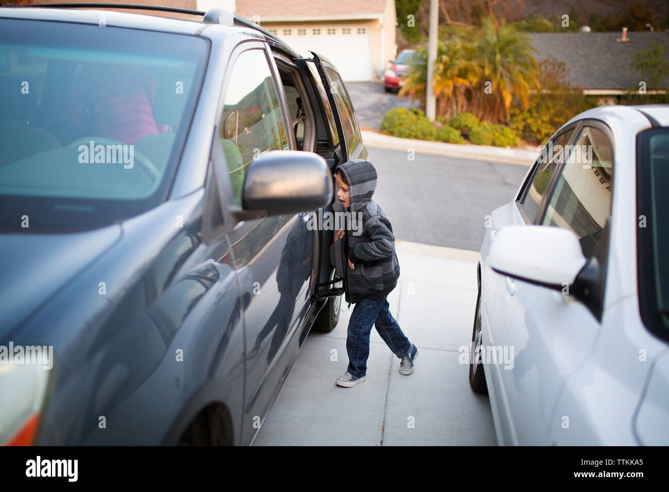 Entering car hi-res stock photography and images - Alamy