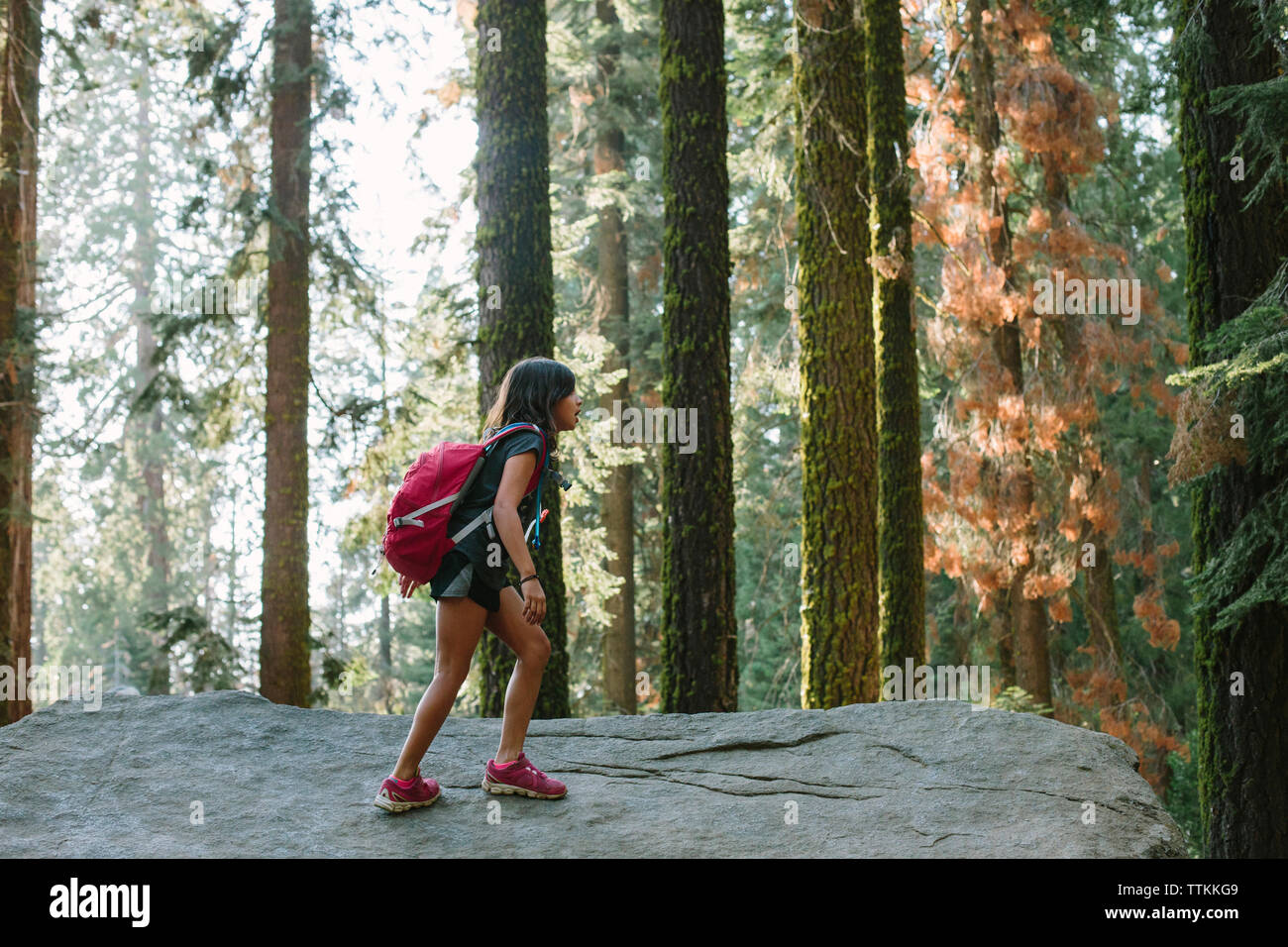 Girl backpack side view hi-res stock photography and images - Alamy