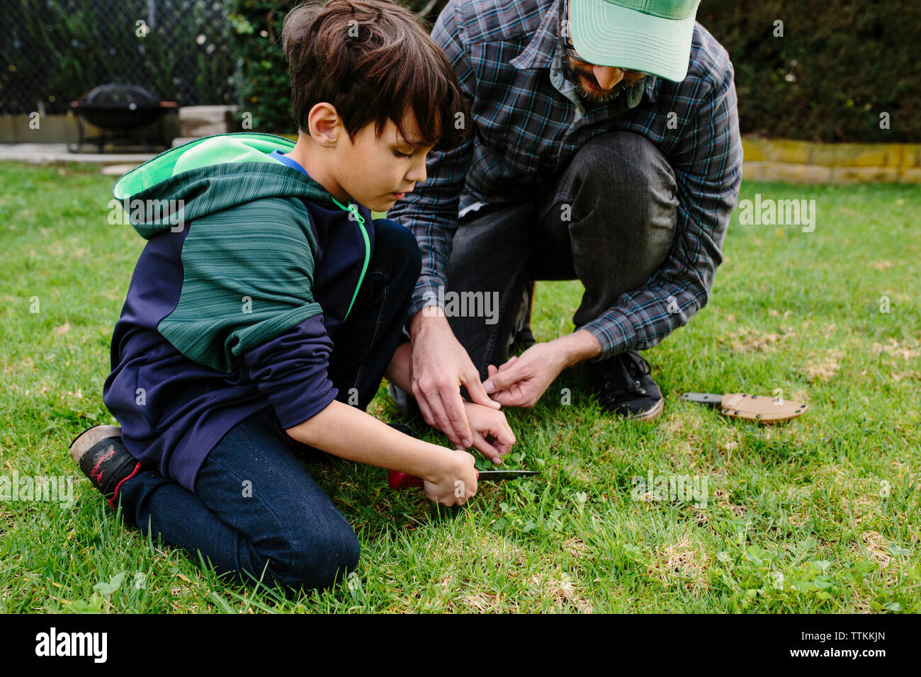 Boy cutting grass hi-res stock photography and images - Alamy