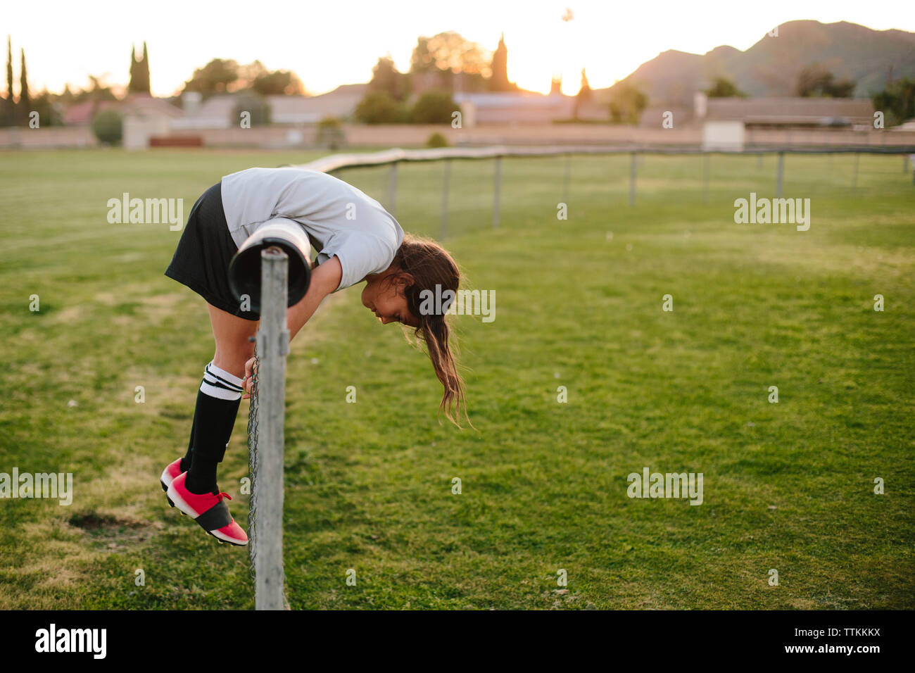 Girl bending over hi-res stock photography and images - Alamy