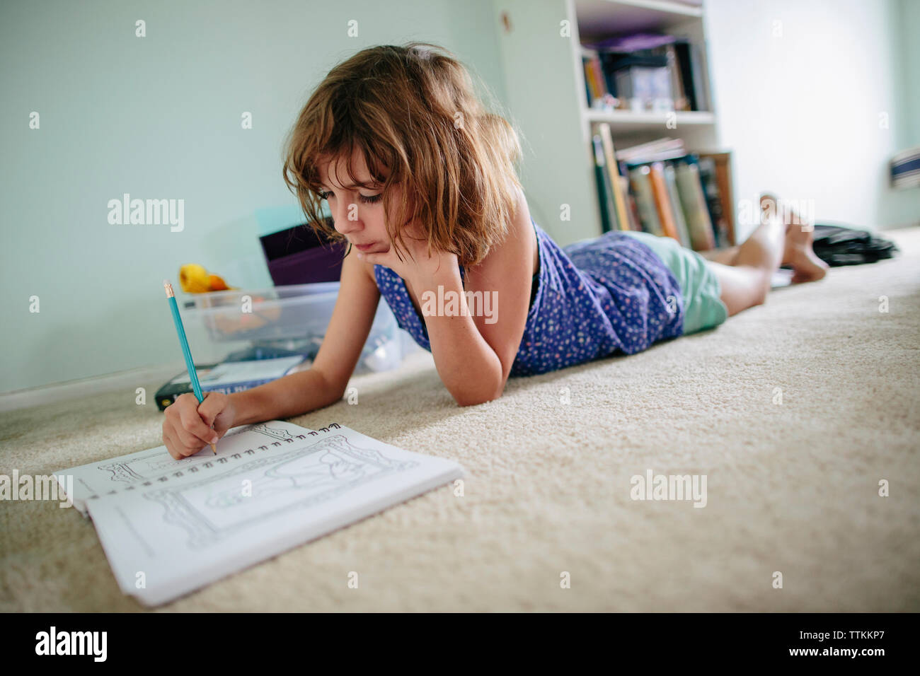 Adolescent do homework at home hi-res stock photography and images - Alamy