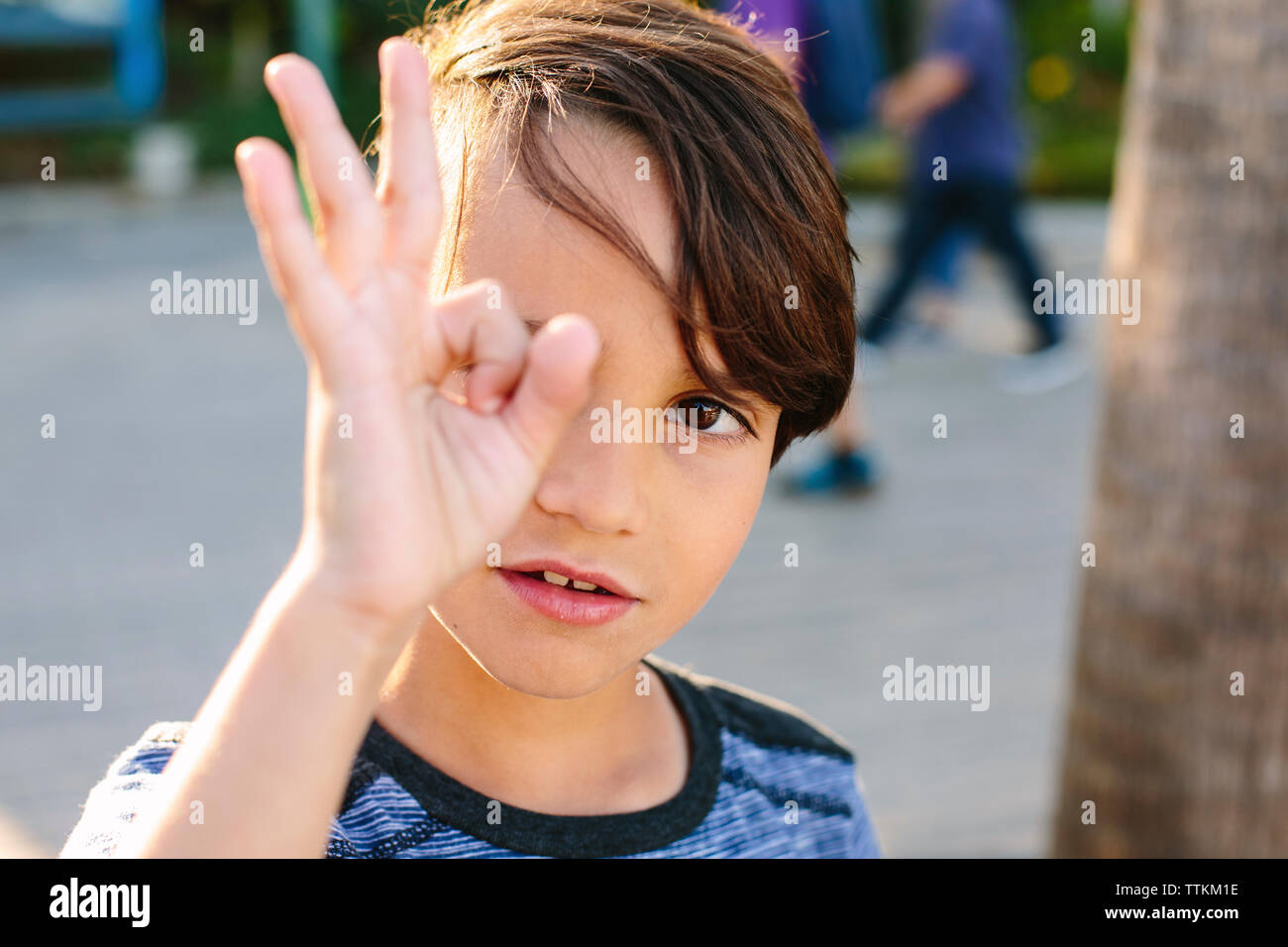 Boy looking at sign hi-res stock photography and images - Alamy