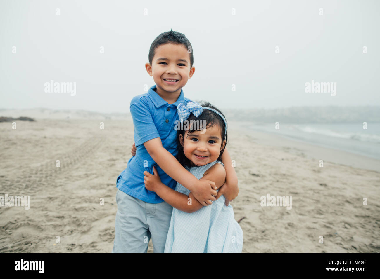 Brother sister hug hi-res stock photography and images - Alamy