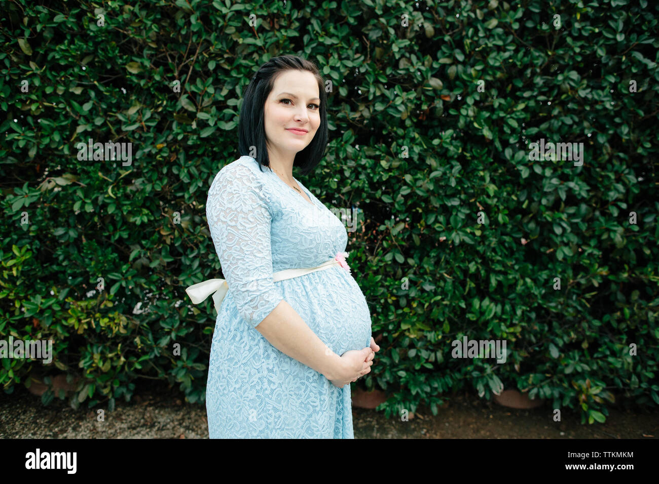 Beautiful pregnant woman poses for a portrait Stock Photo - Alamy