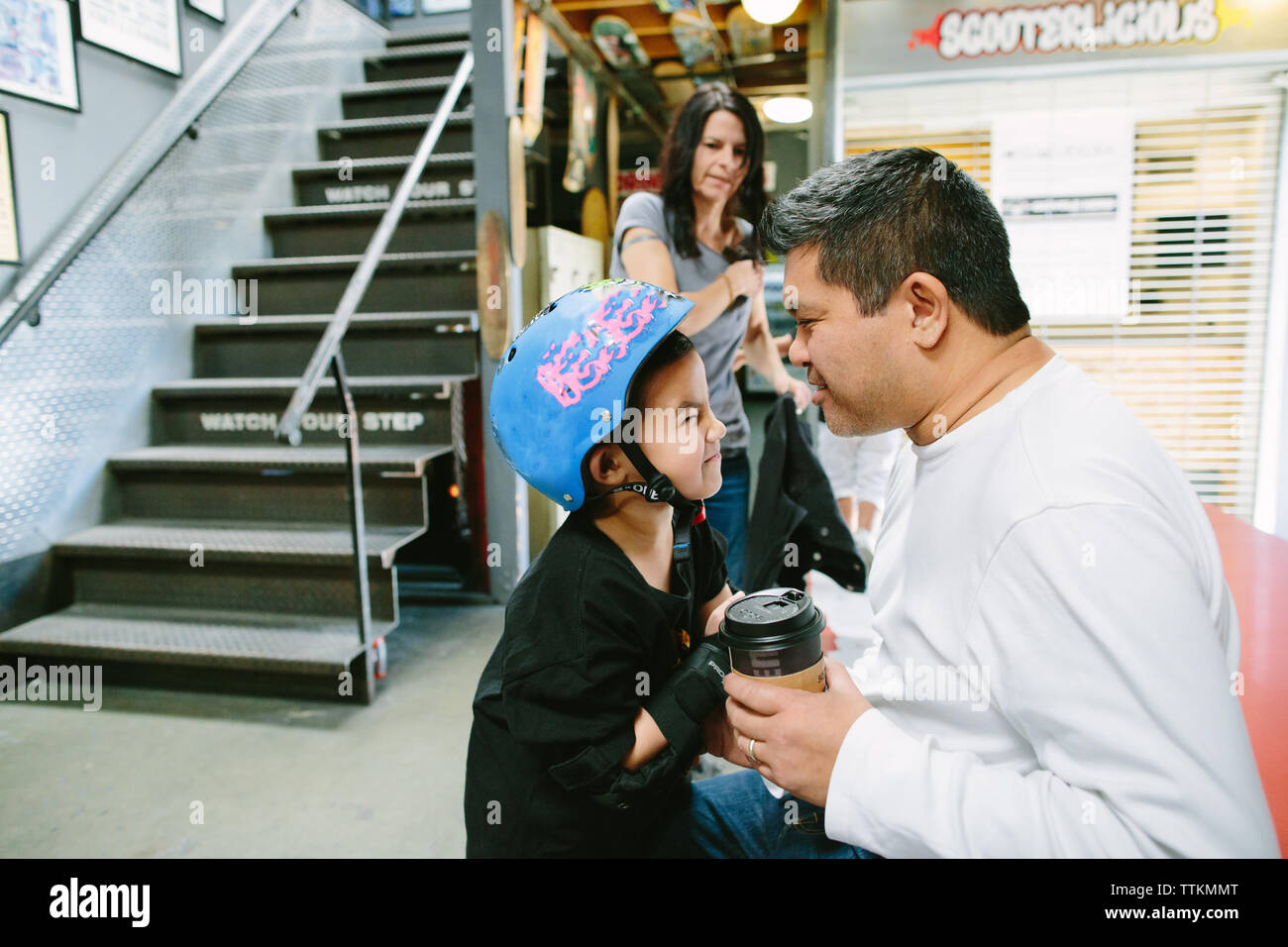 Father and son stare at each other while son makes a silly face Stock ...