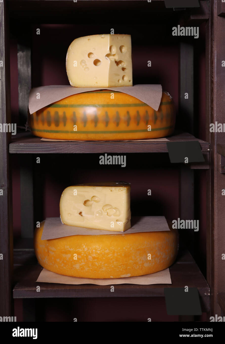 Fresh cheese on the shelf in cellar Stock Photo - Alamy