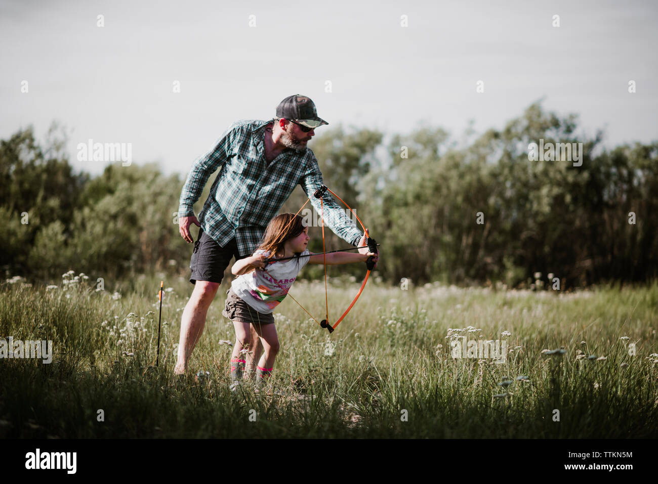 Father bow arrow hi-res stock photography and images - Alamy