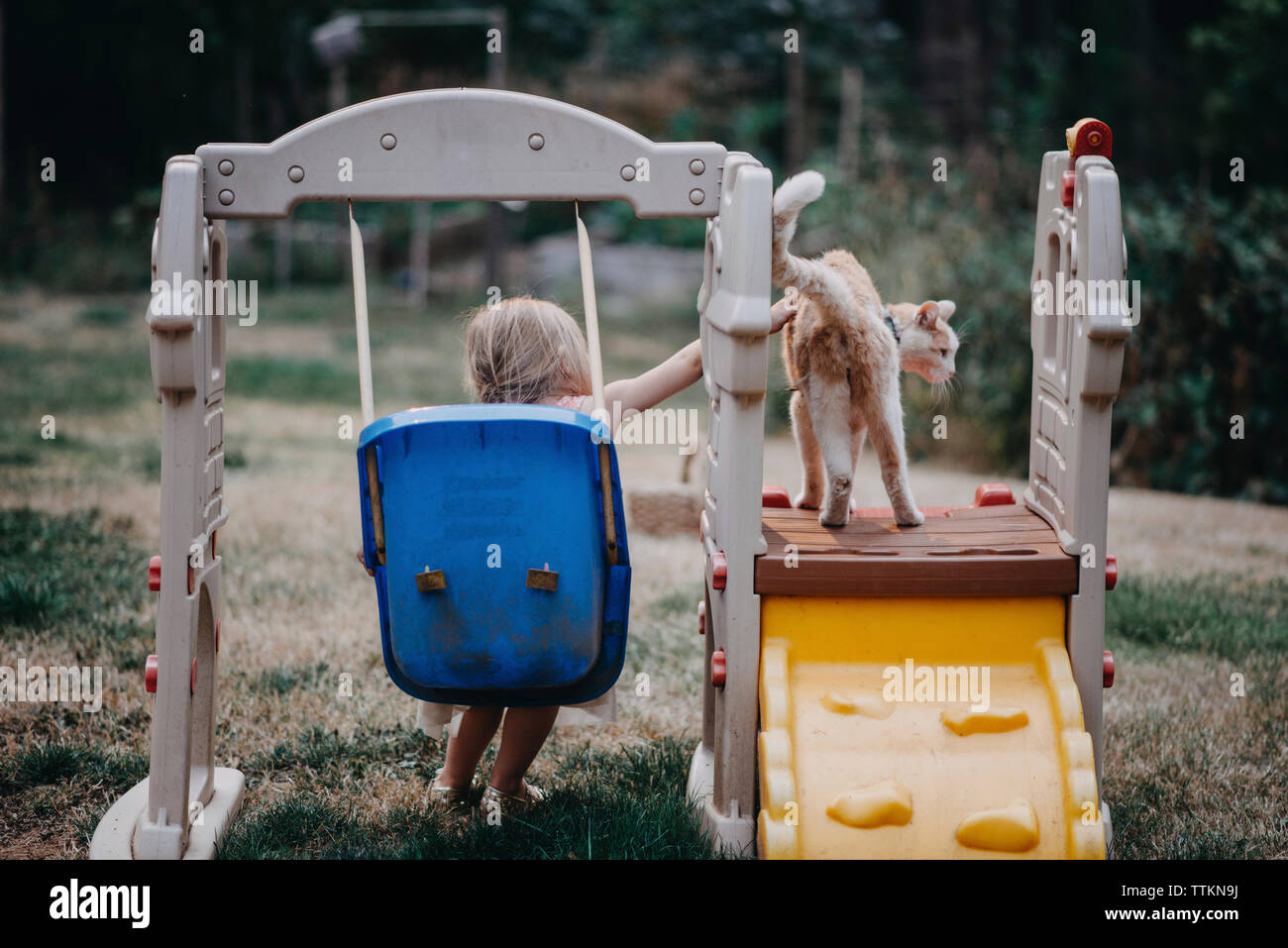 Rear view female playground hi-res stock photography and images - Alamy