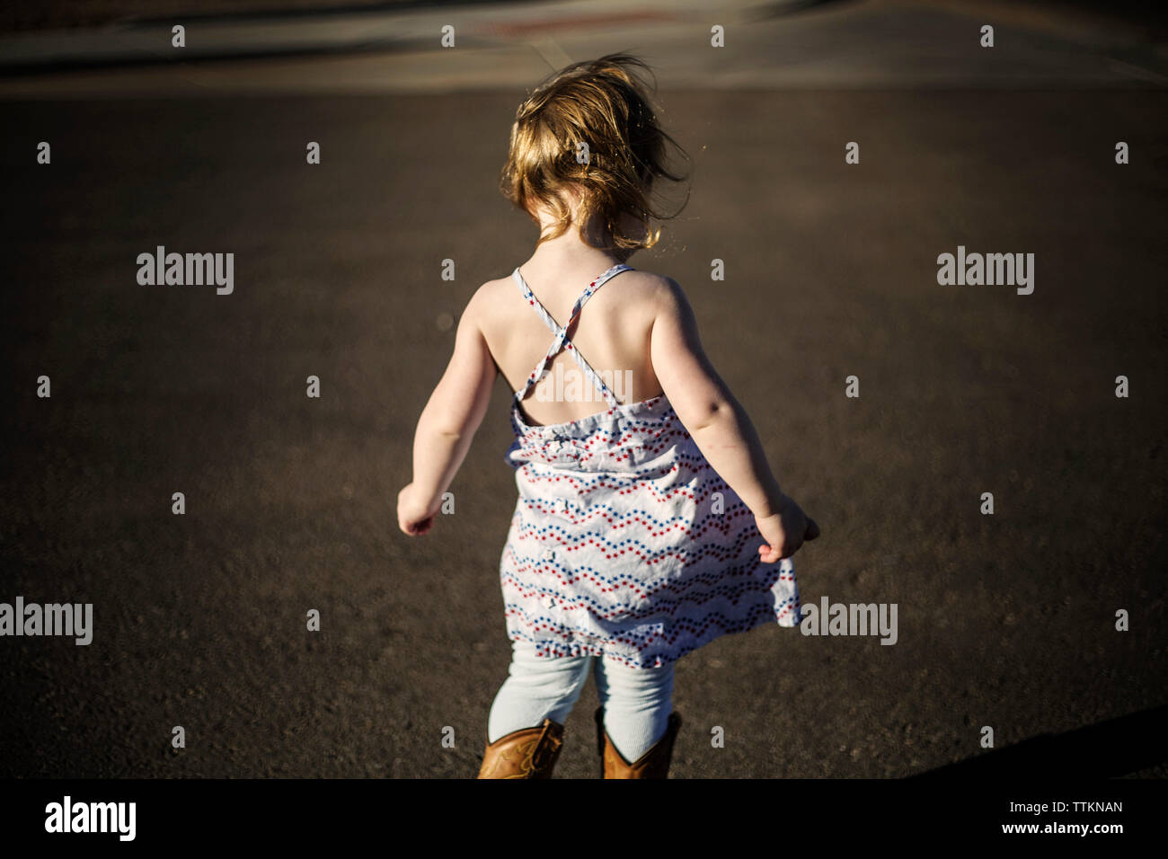 Girl standing on road hi-res stock photography and images - Alamy