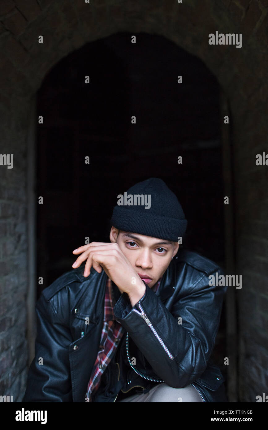 Sitting man with hat hi-res stock photography and images - Alamy