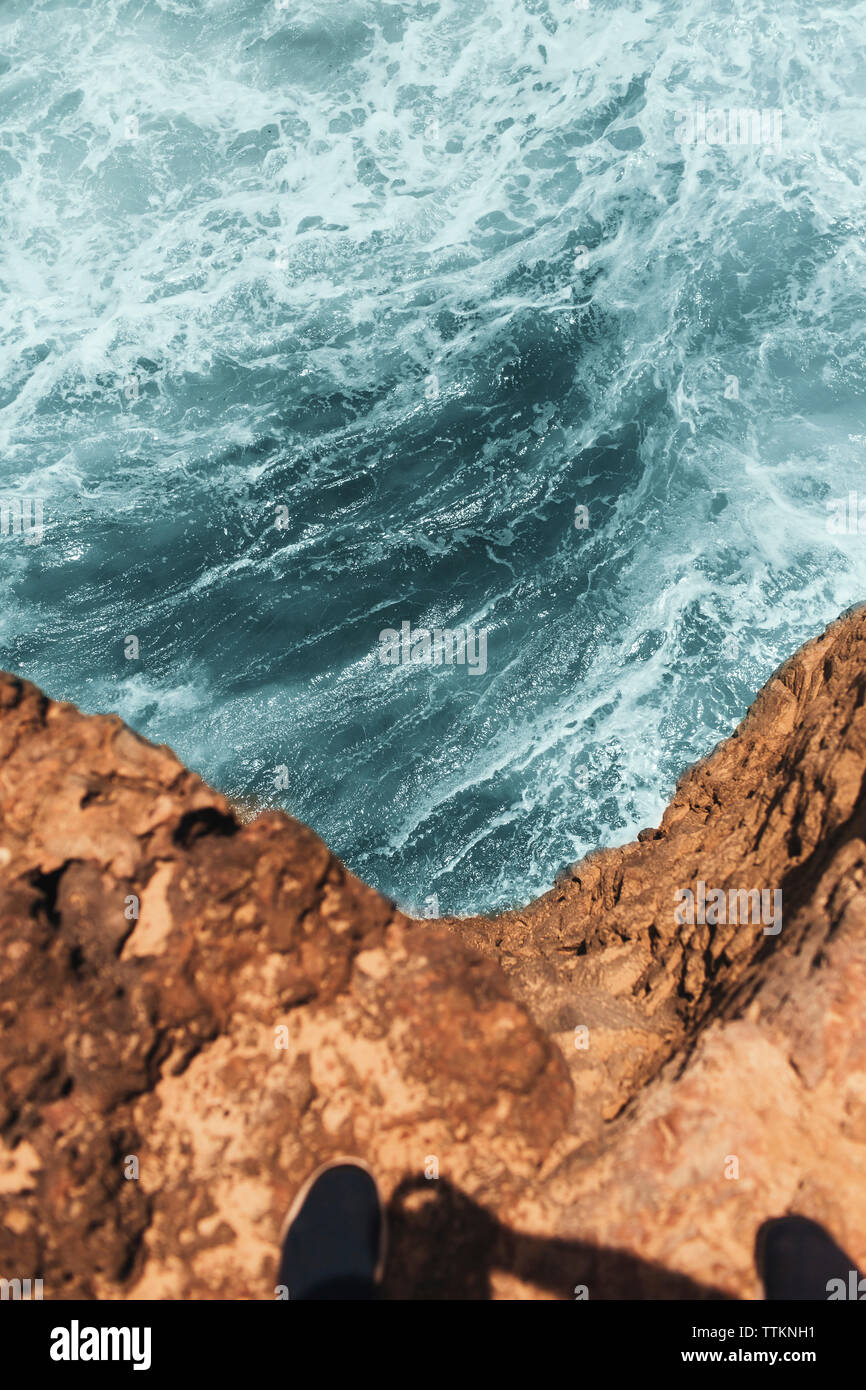 Overhead view of rock by sea Stock Photo - Alamy