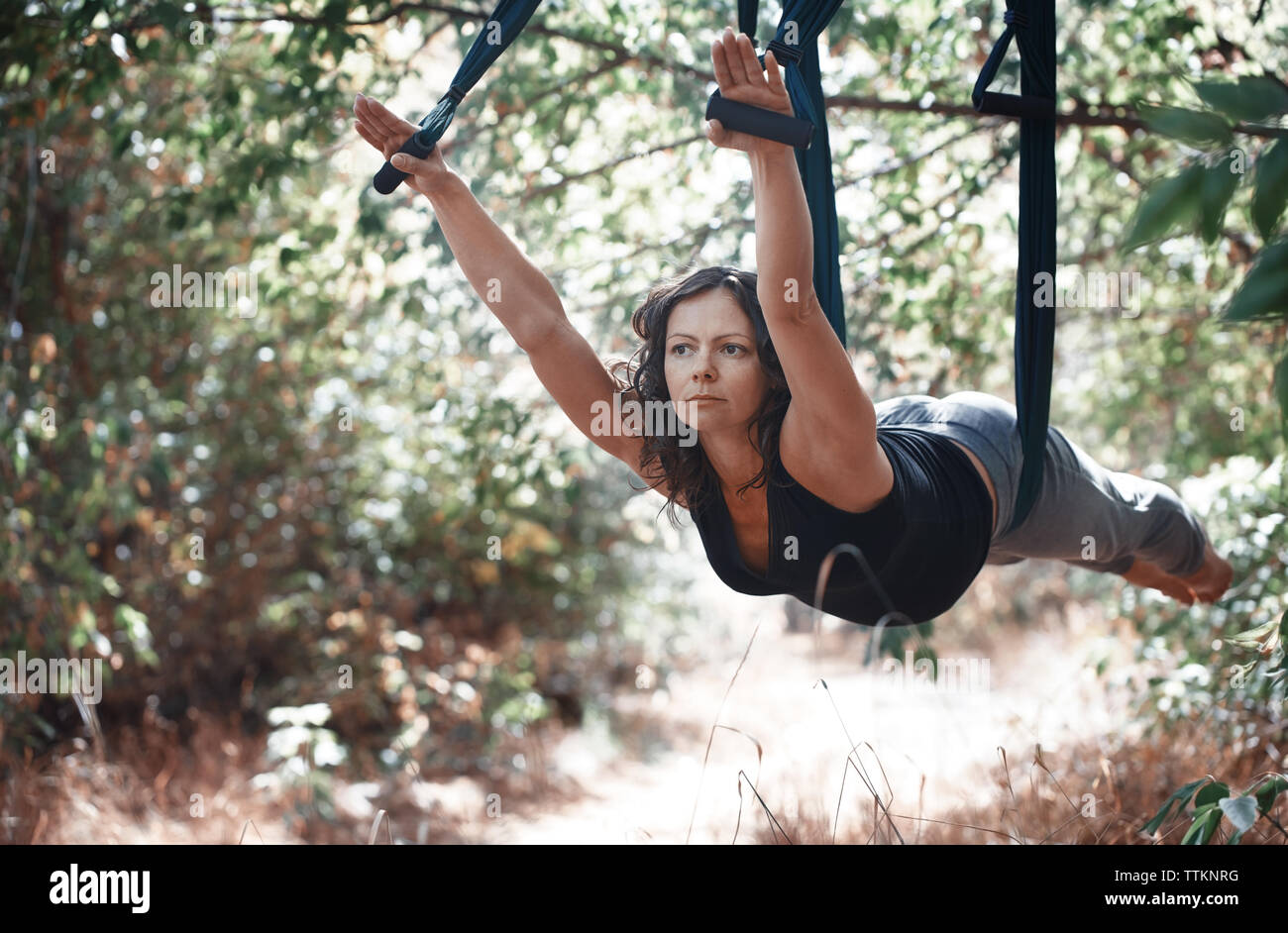 Aerial yoga hammock woman hi-res stock photography and images - Alamy