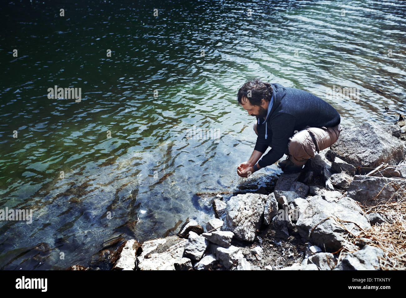 Scooping water hi-res stock photography and images - Alamy